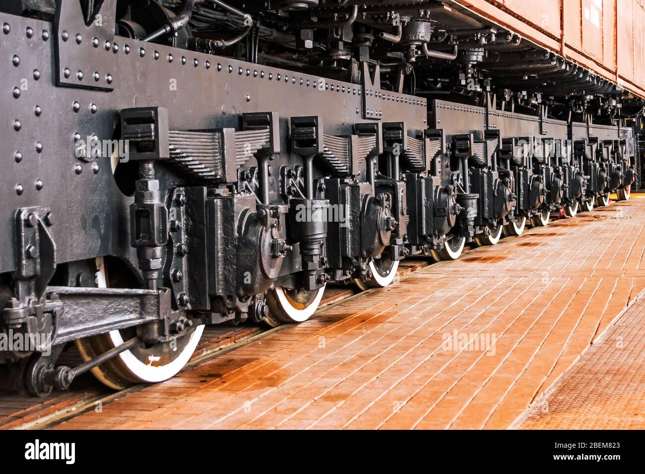 Wheels of a train a carriage, wheels with a white rim Stock Photo - Alamy