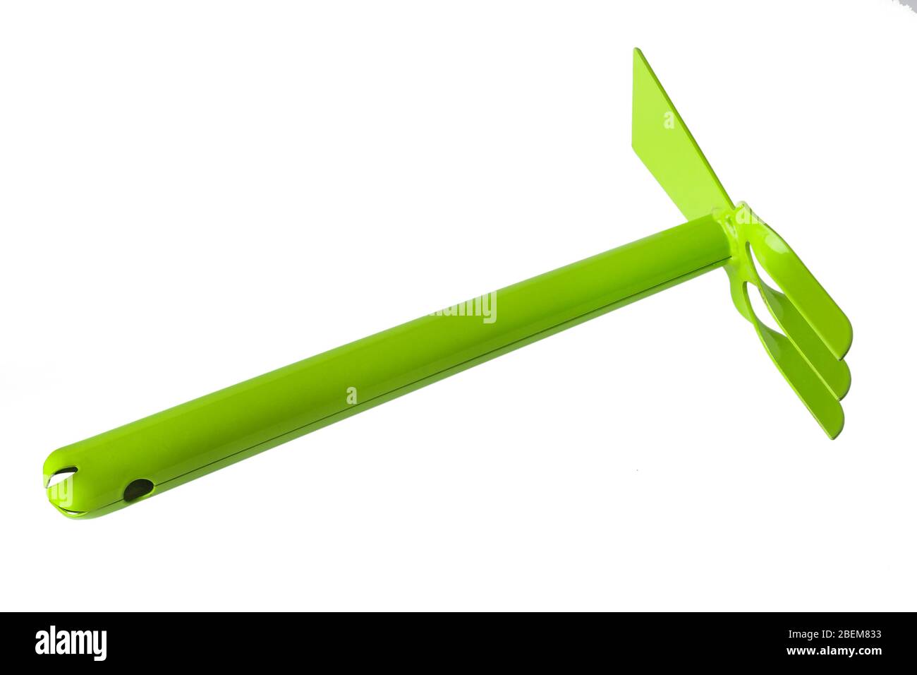 Green metal garden tool with rakes and hoes for working beds Stock ...