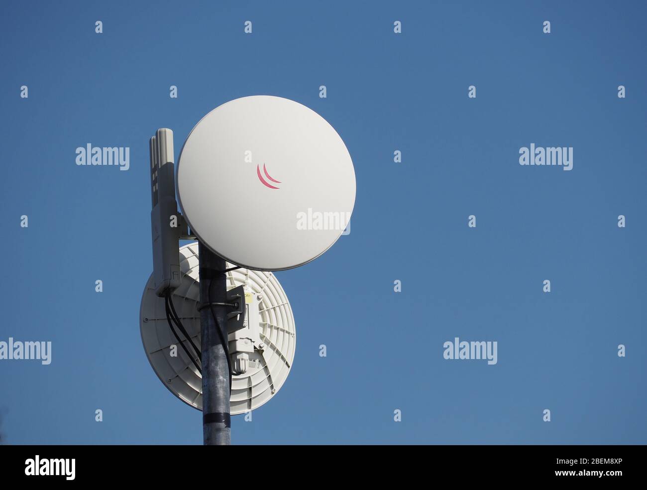 Aerials/router of rural broadband wireless Internet service. Dishes for ...