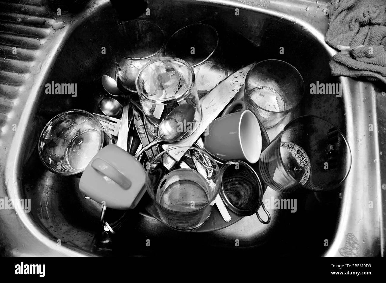Kitchen washing up Black and White Stock Photos & Images - Alamy