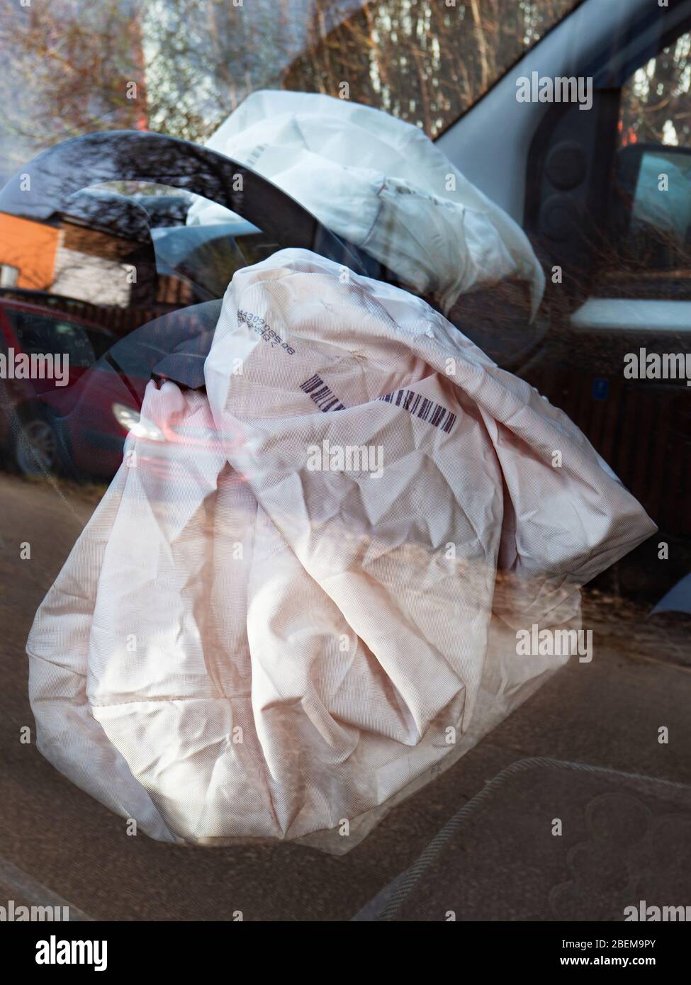 Car crash and airbag worked well. Deflated airbags after the erupted ...