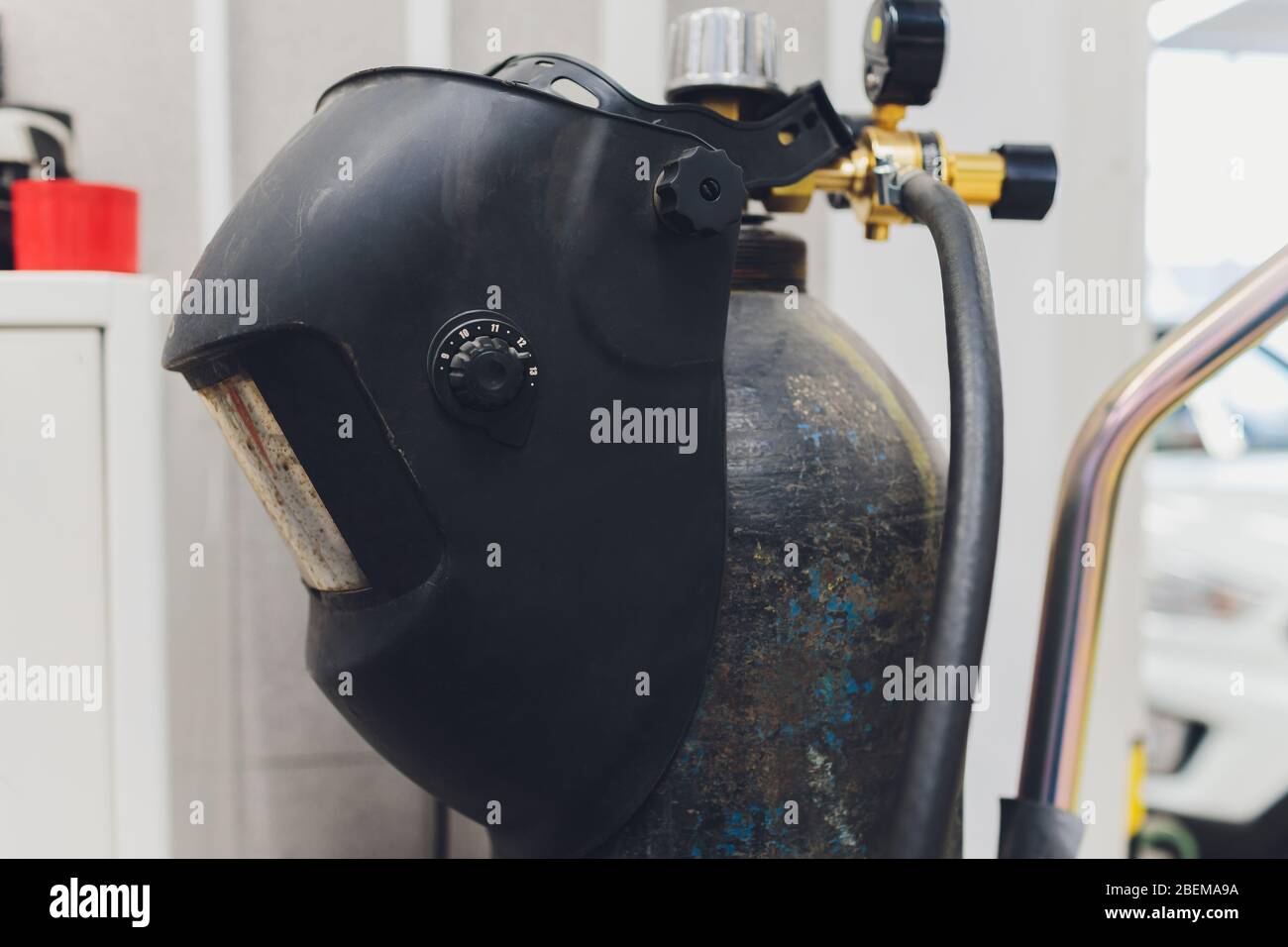 the mask and gas balloon welding equipment Stock Photo - Alamy
