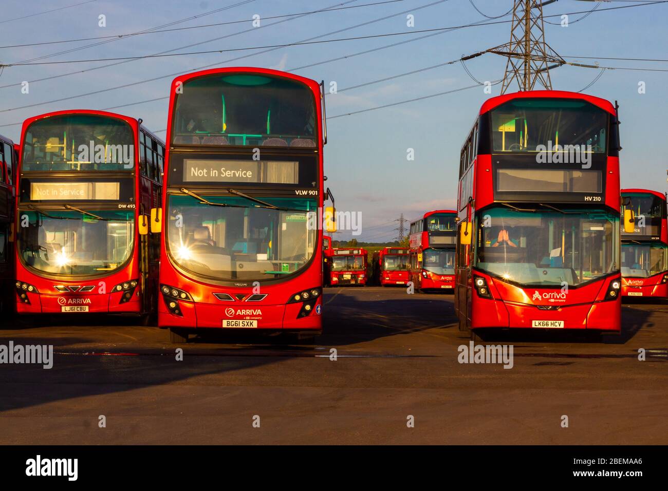 London transport busses waiting in a bus depot Stock Photo - Alamy