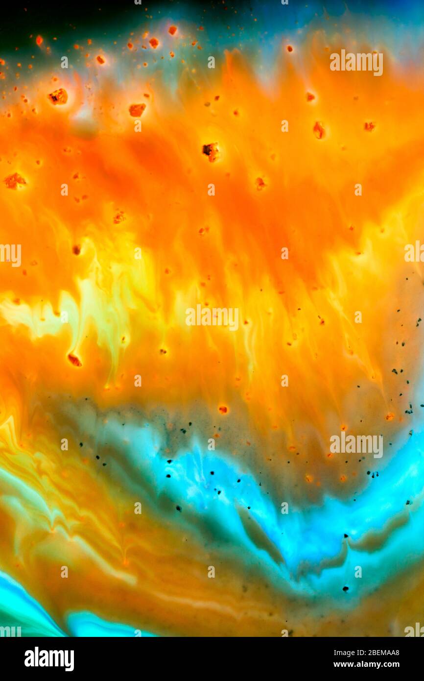 Ink flowing macrophotography that looks like waves of fire Stock Photo ...
