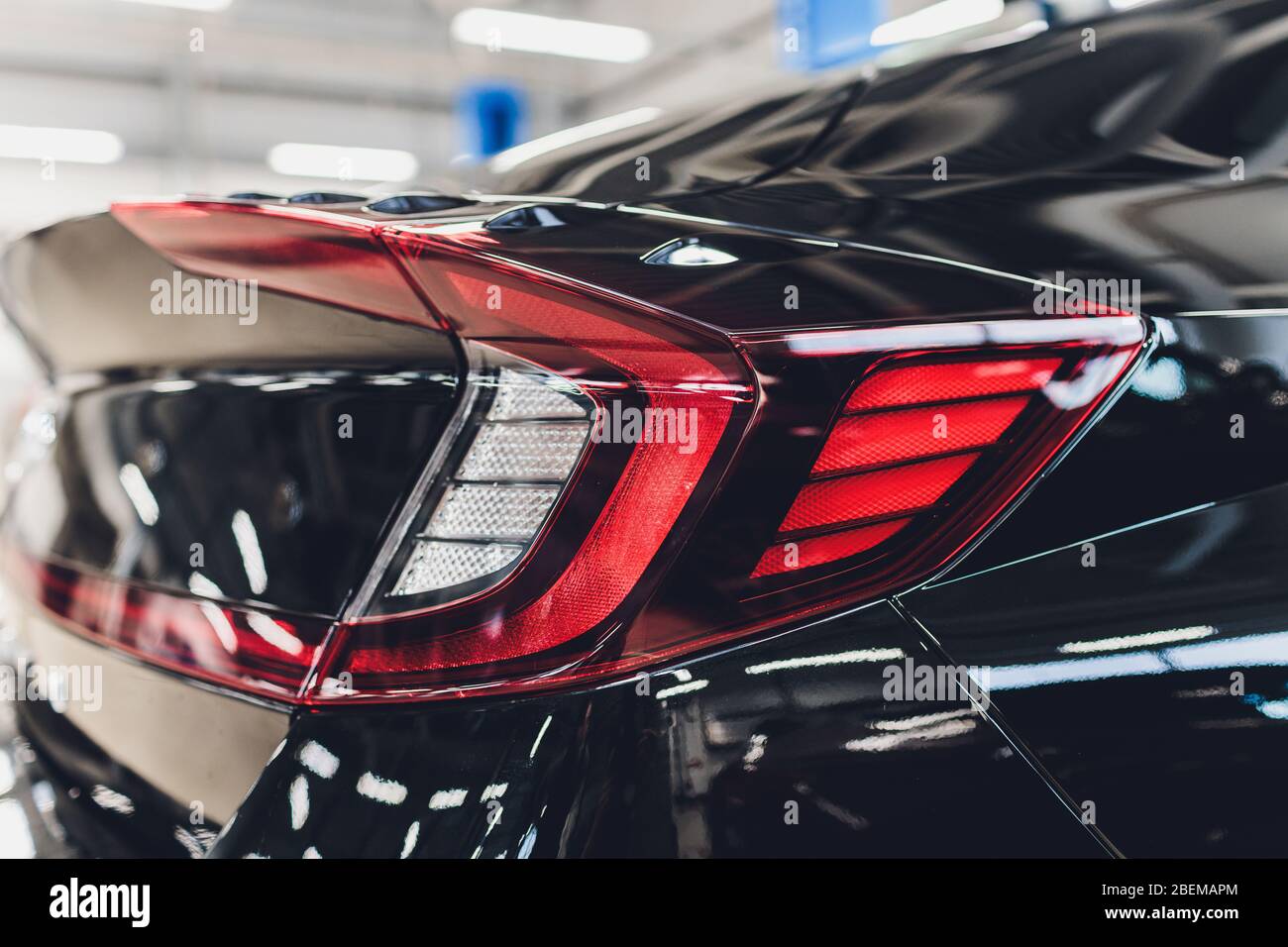 Car detail. New led taillight by night. The rear lights of the car, in ...
