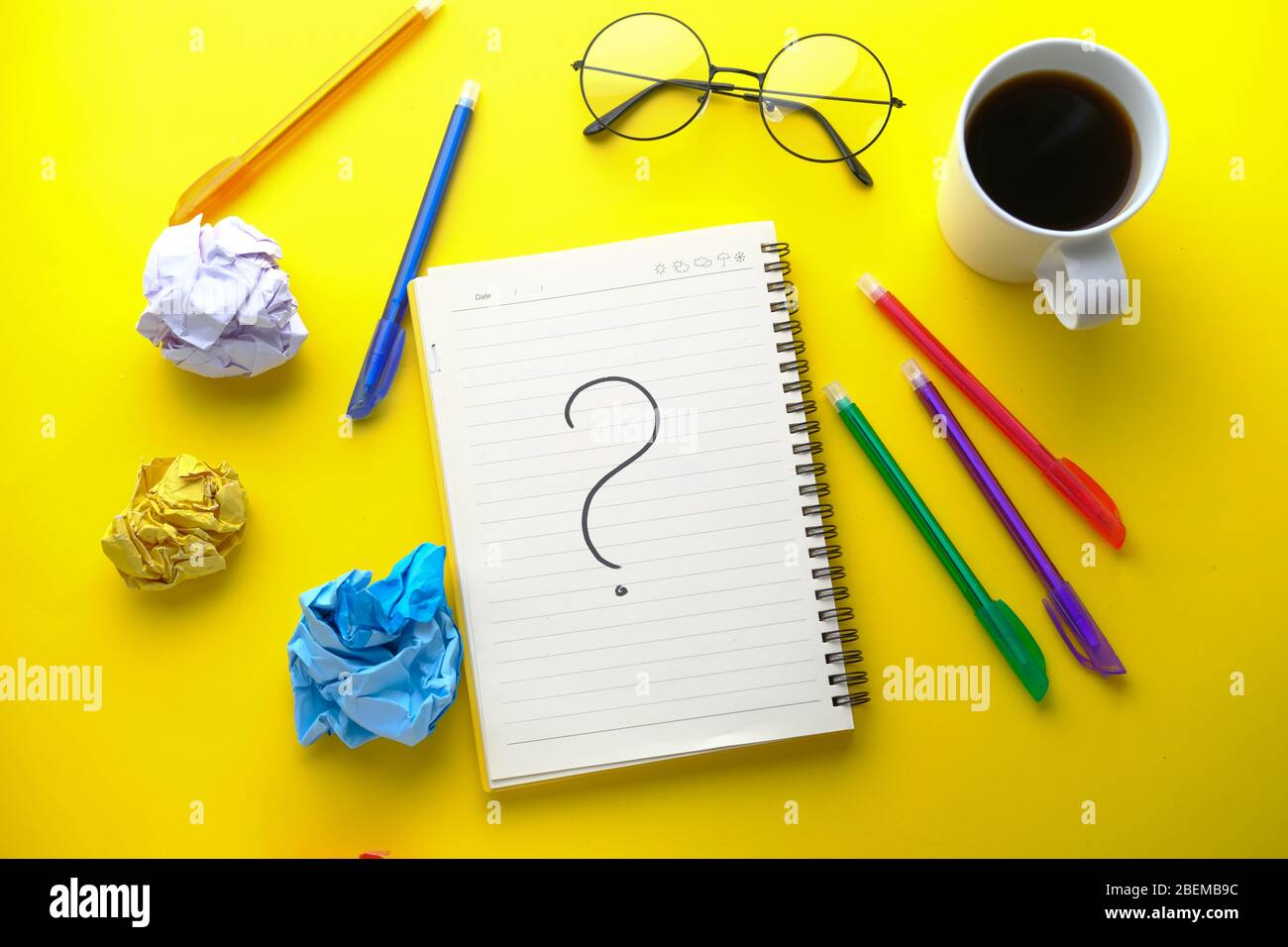 high angle view of question mark on notepad Stock Photo - Alamy