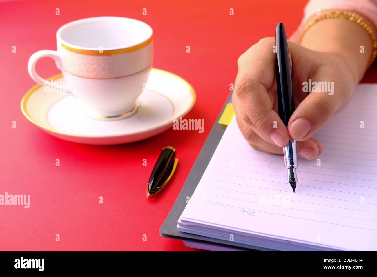 women hand writing on notepad, copy space Stock Photo - Alamy