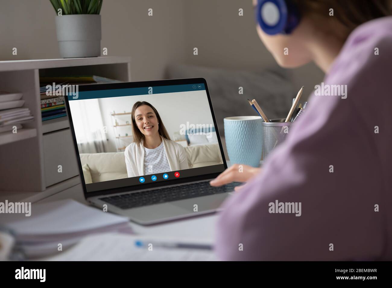 Two girls best friends chatting using virtual modern videoconference ...