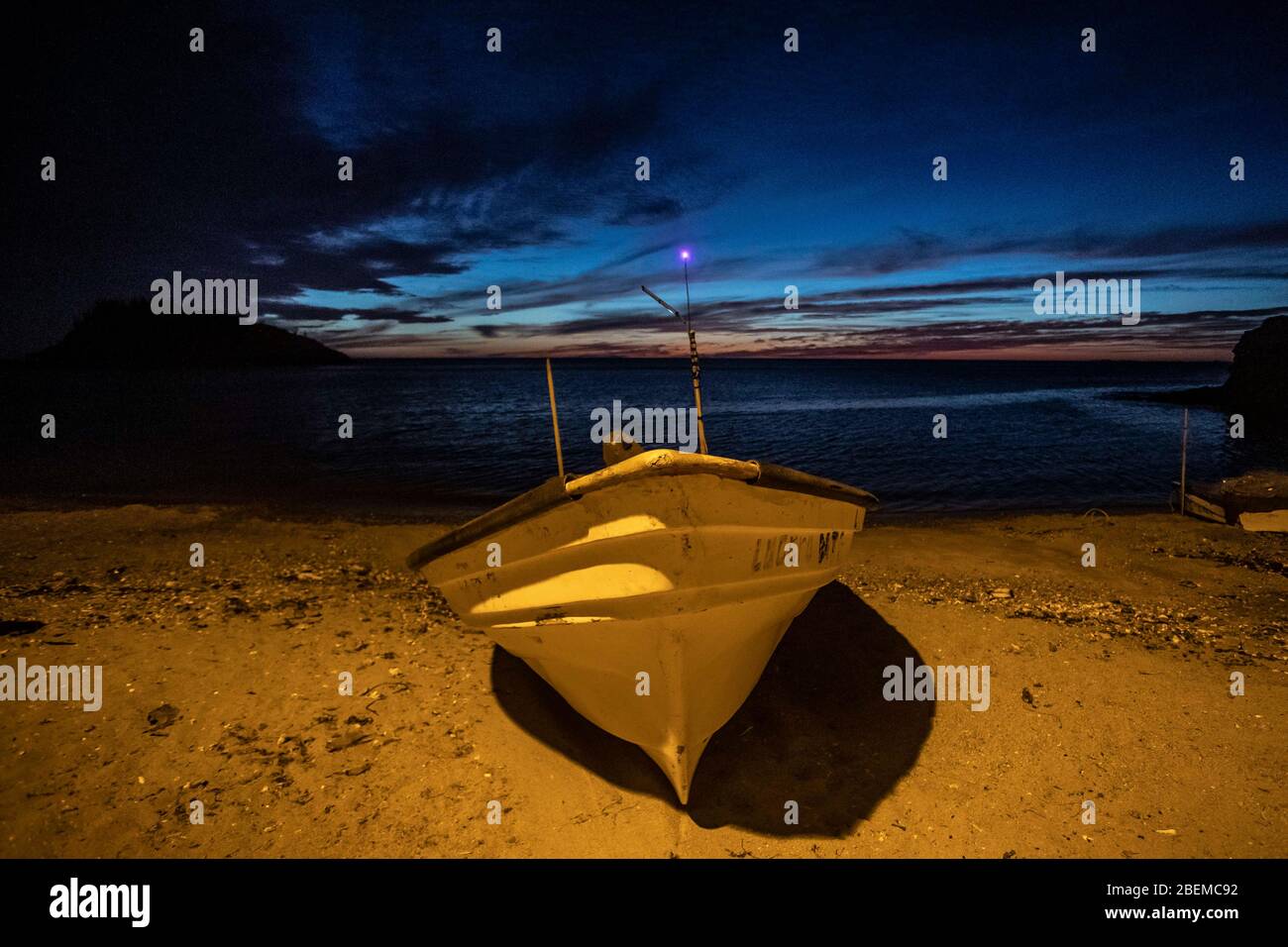 pangas or fishing boats on the beach at sunset or dusk on El Choyudo ...