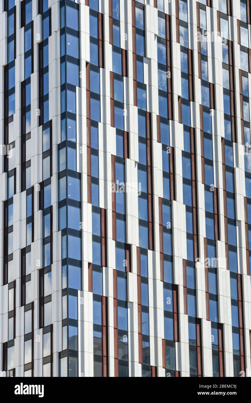 Pattern formed by windows and cladding on the outside of the multi ...