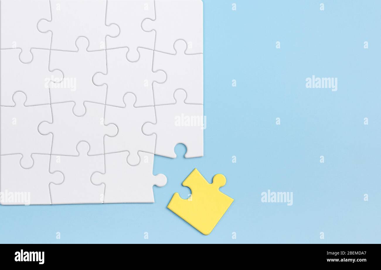 Out of the box thinking and individuality concept. Yellow puzzle ...