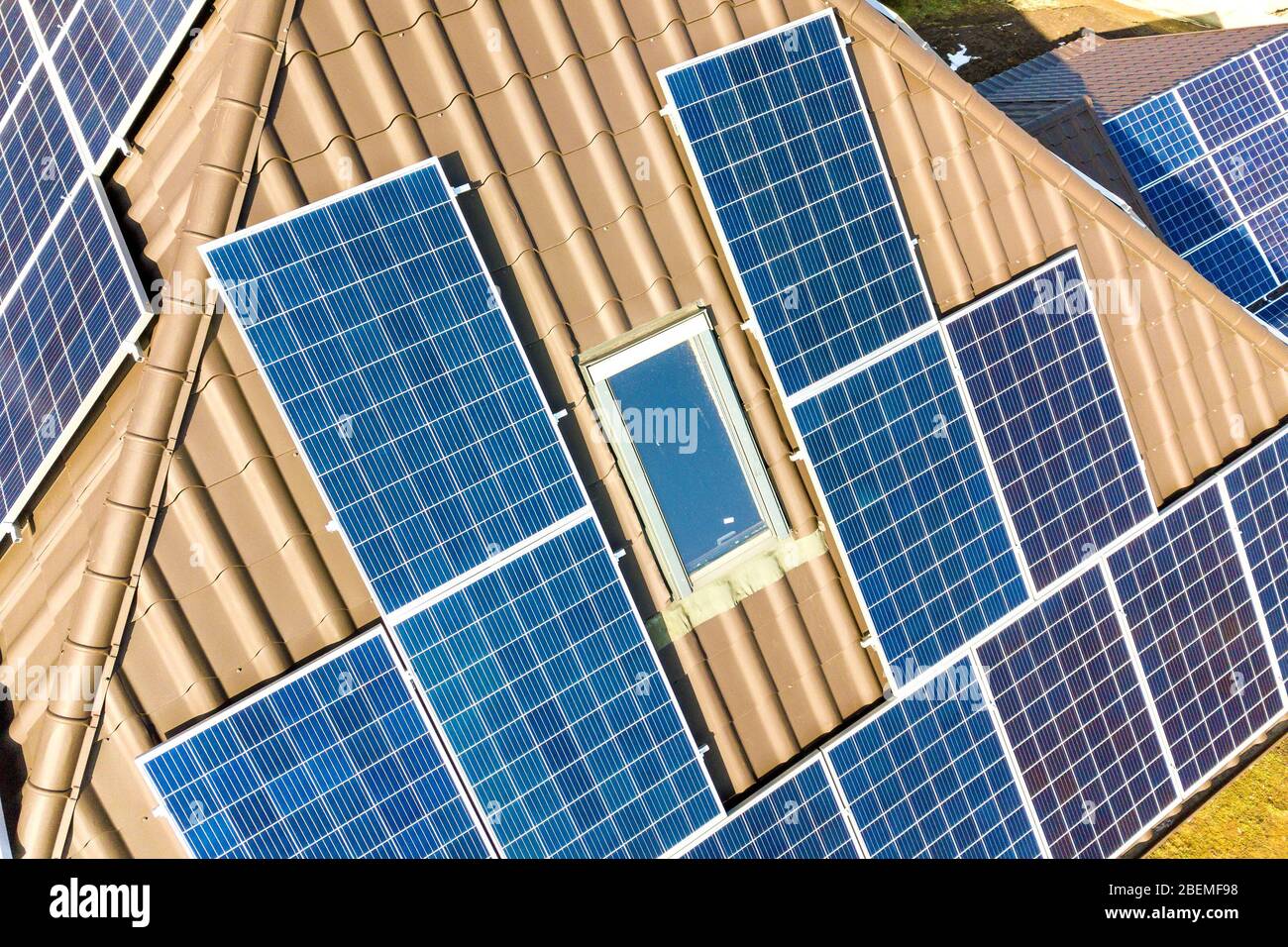 Aerial top view of new modern residential house cottage with blue shiny ...
