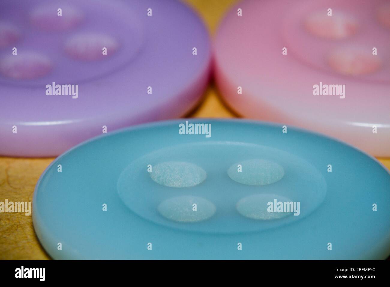 Close-up a set of colourful shirt buttons Stock Photo - Alamy