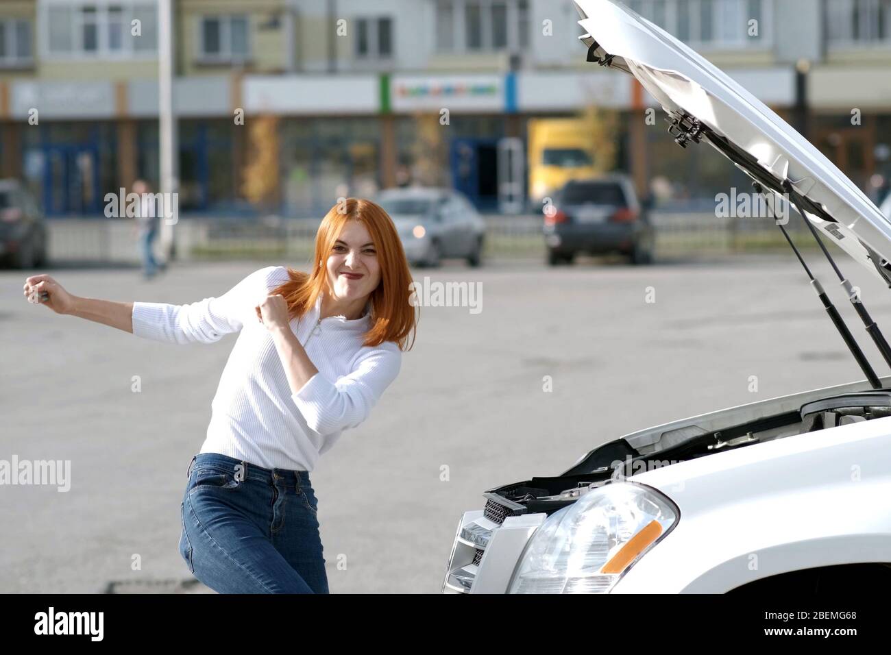 Car funny woman breakdown hi-res stock photography and images - Alamy