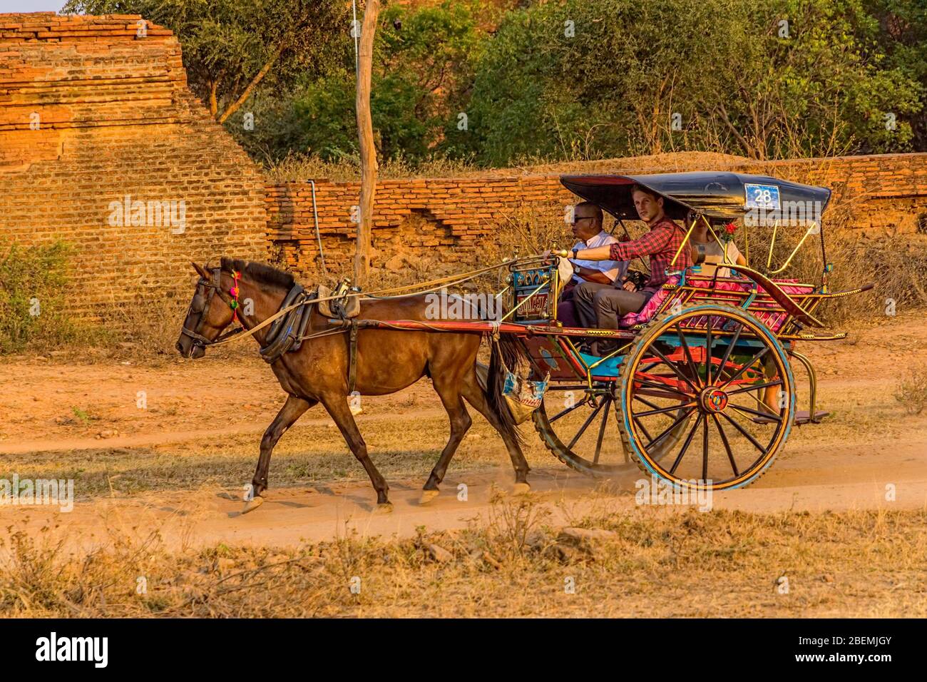 Tourist taking cart ride, Bagan Stock Photo - Alamy