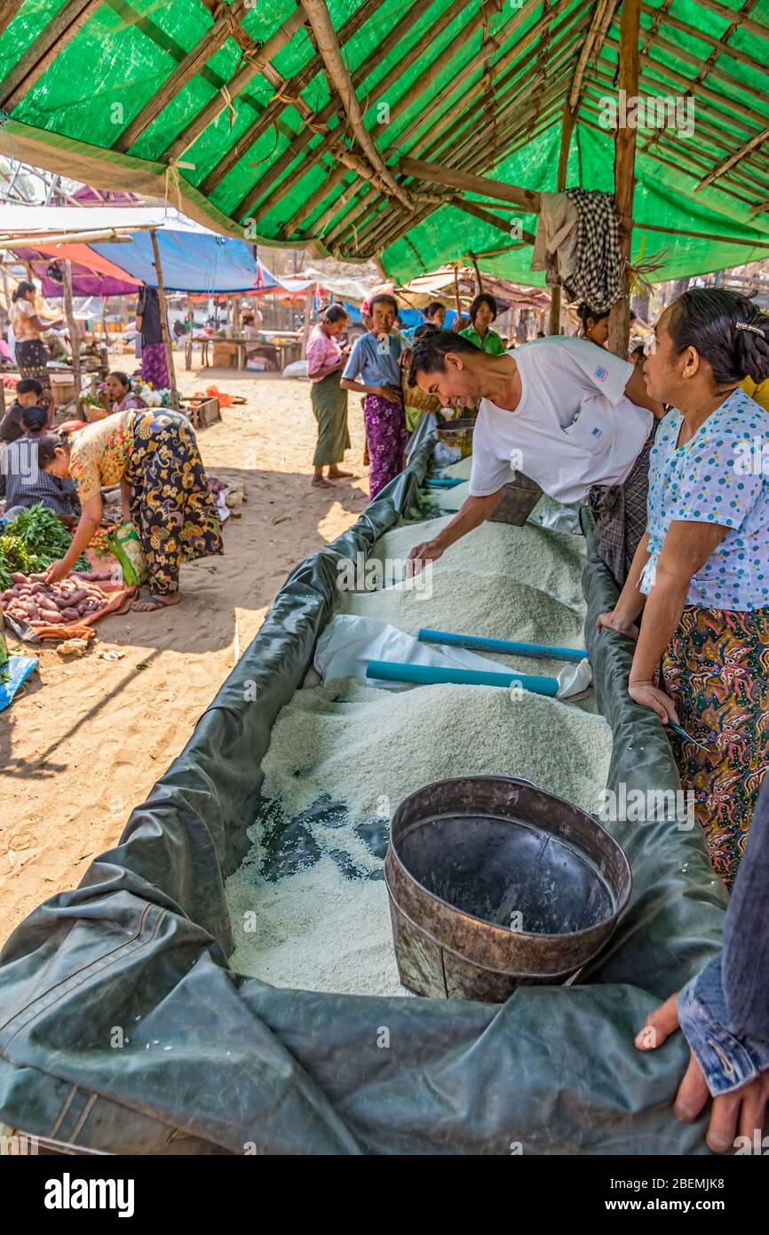 selling rice at the local market Stock Photo - Alamy