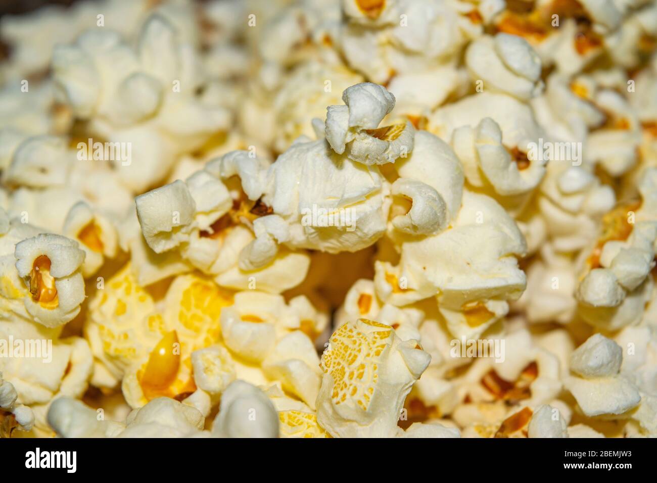 Popcorn surface texture background image. Close up Stock Photo - Alamy