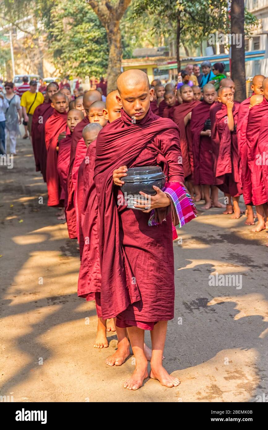Novice monks with tourists hi-res stock photography and images - Alamy