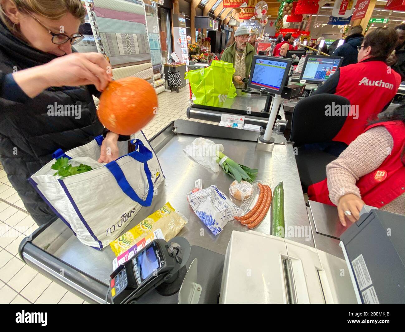 Paris, France - Dec 21, 2020: Overhead view of woman at packing in her ...