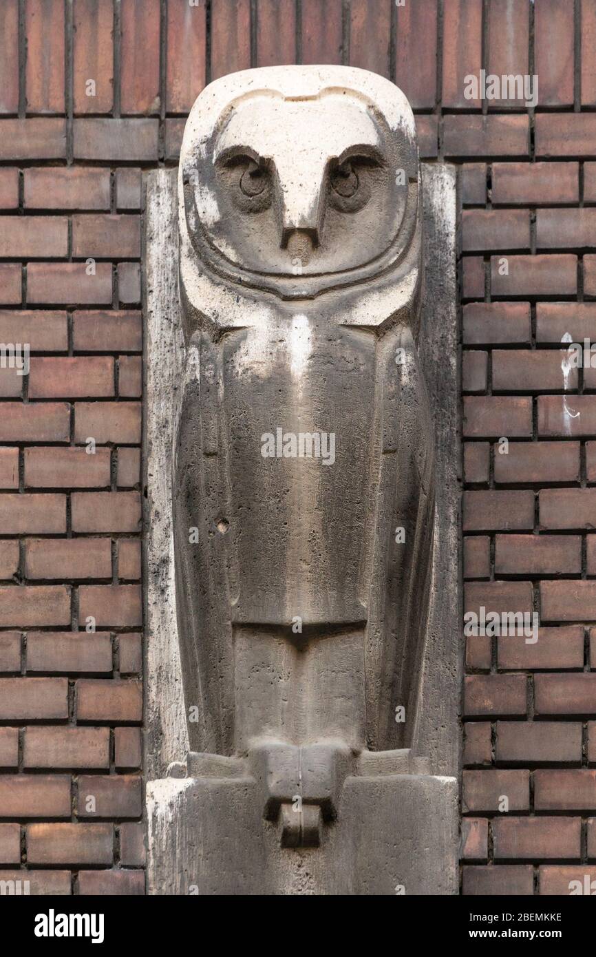 Sculpture of an owl set against a brick wall in Budapest Stock Photo ...