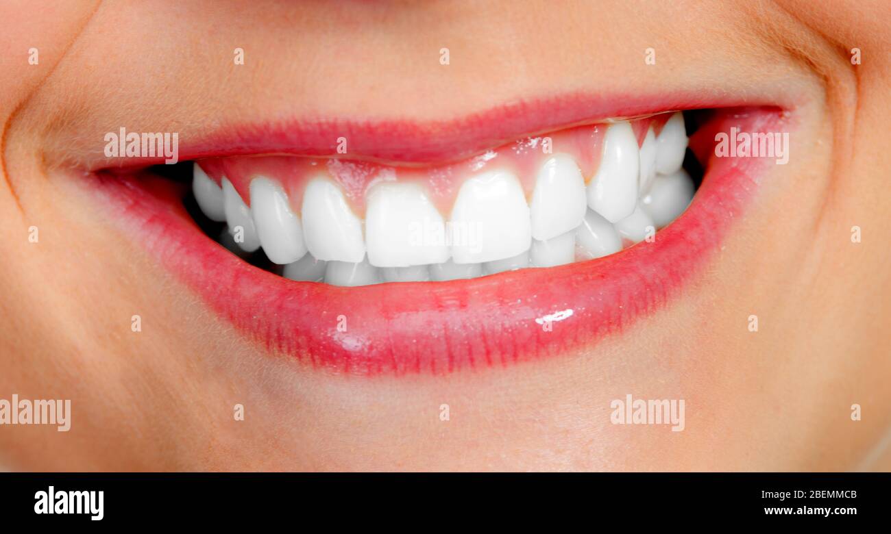 Perfect straight teeth hi-res stock photography and images - Alamy