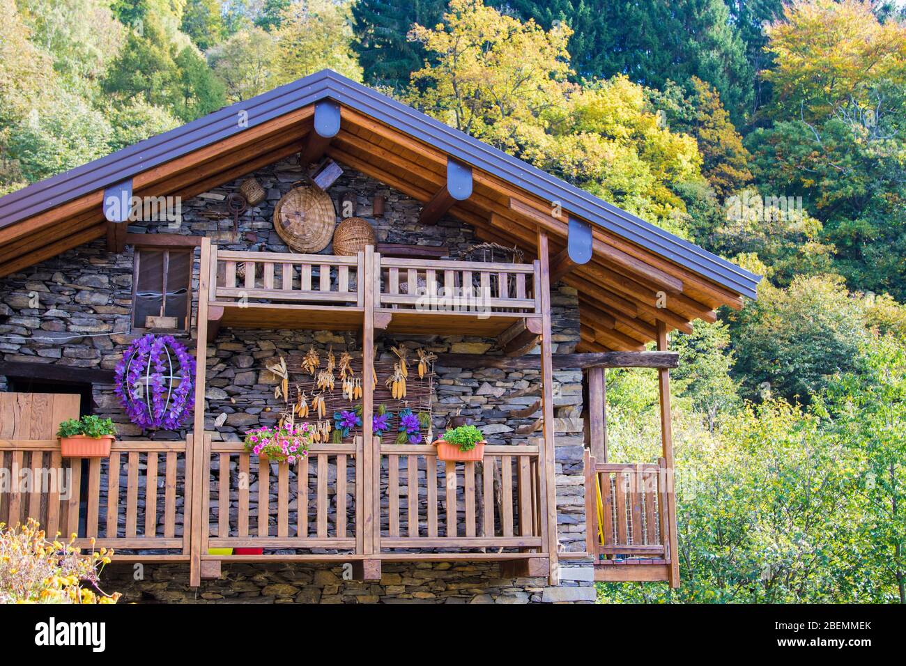 old alpine village built on top of a mountain. Bell towers,Houses and ...