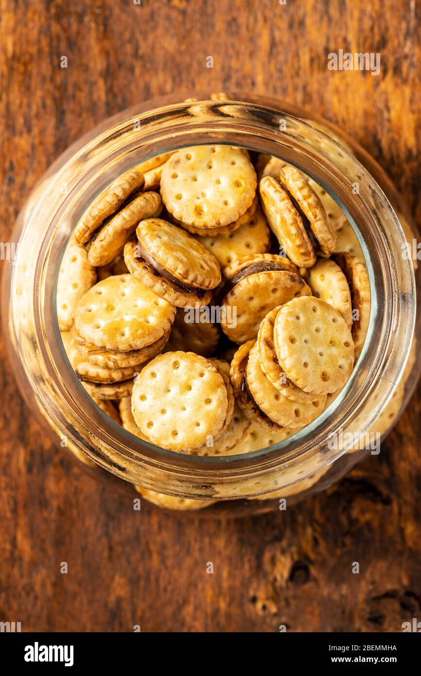 Mini cream sandwich cookies in jar. Top view Stock Photo - Alamy