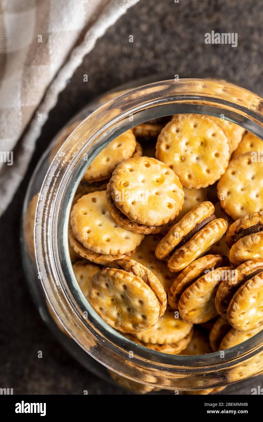 Mini cream sandwich cookies in jar. Top view Stock Photo - Alamy