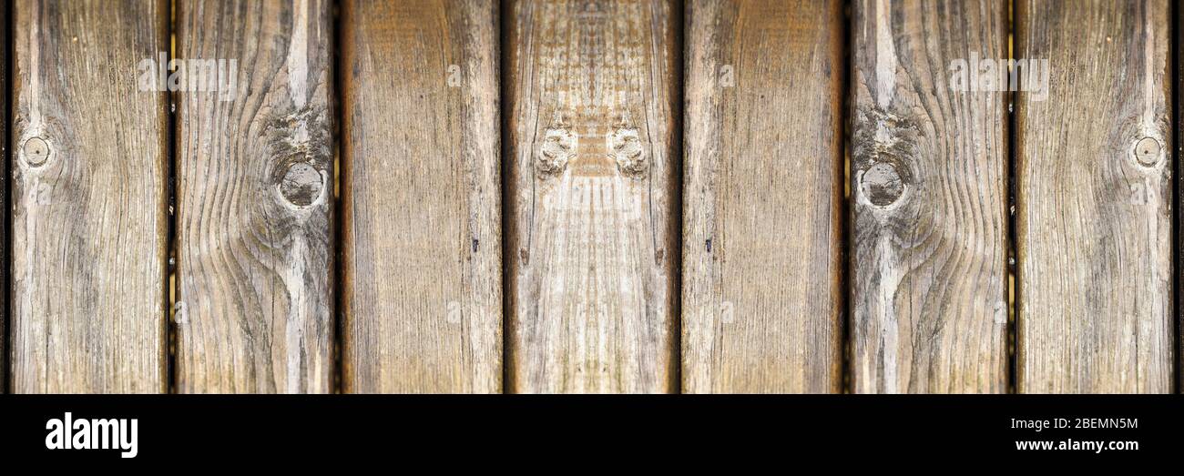 background of wooden boards, vertical texture of a fence with space for ...