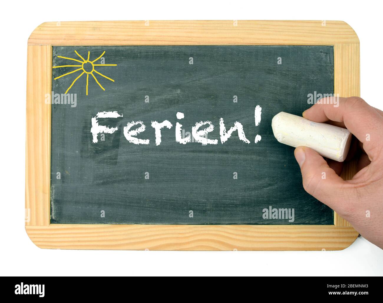 Hand writing the german word Ferien on a chalkboard translate hollidays ...