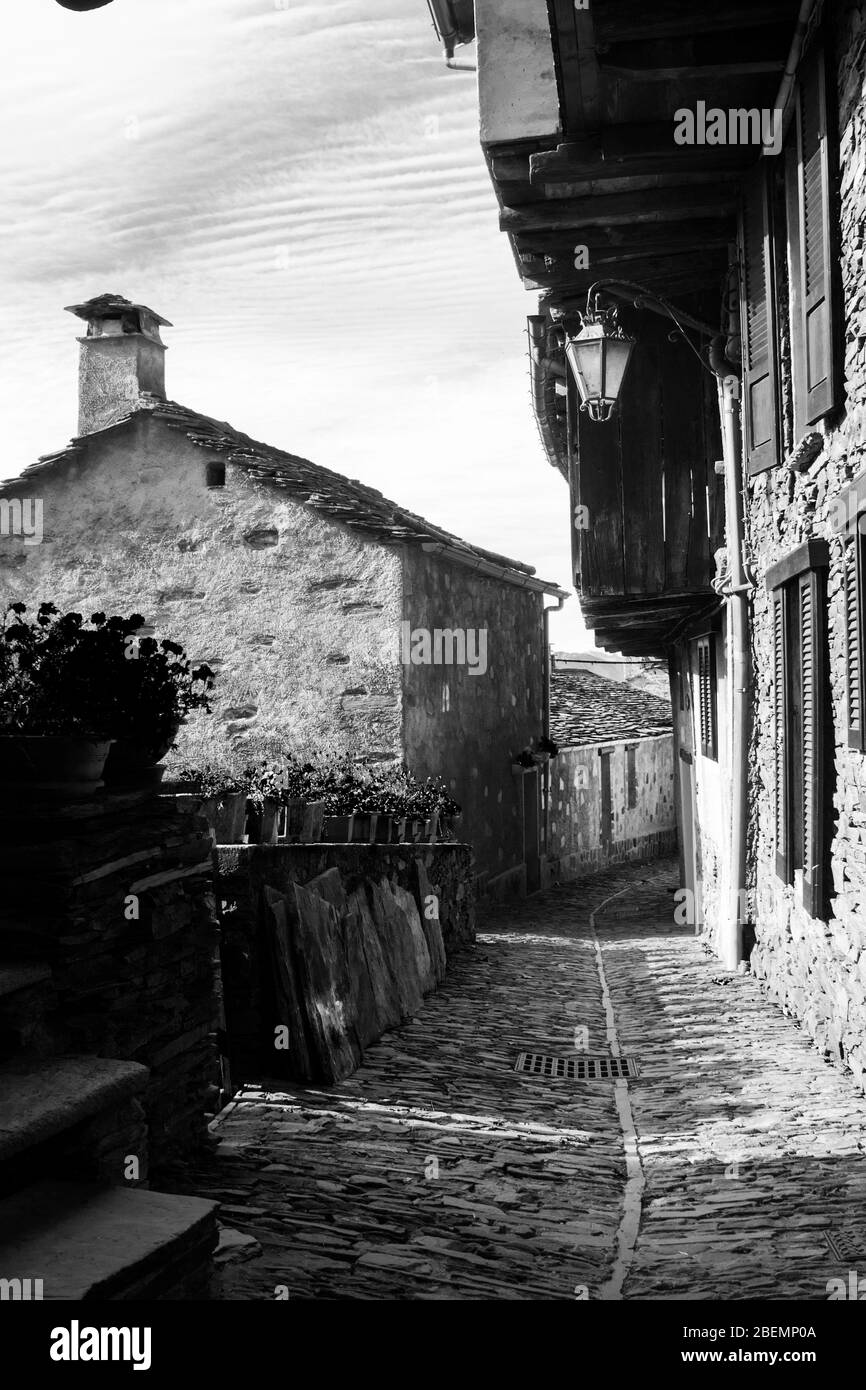 old alpine village built on top of a mountain. Bell towers,Houses and ...