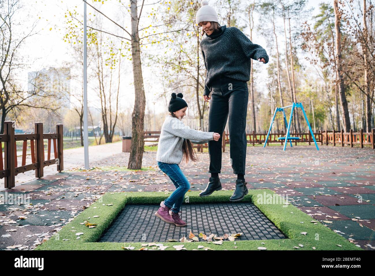Family jump trampoline hi-res stock photography and images - Alamy
