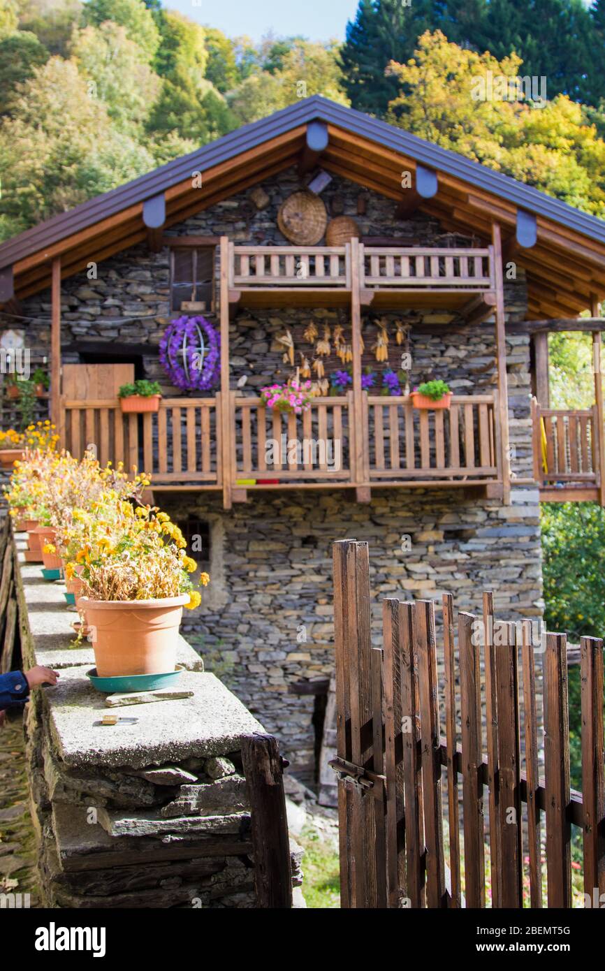 old alpine village built on top of a mountain. Bell towers,Houses and ...