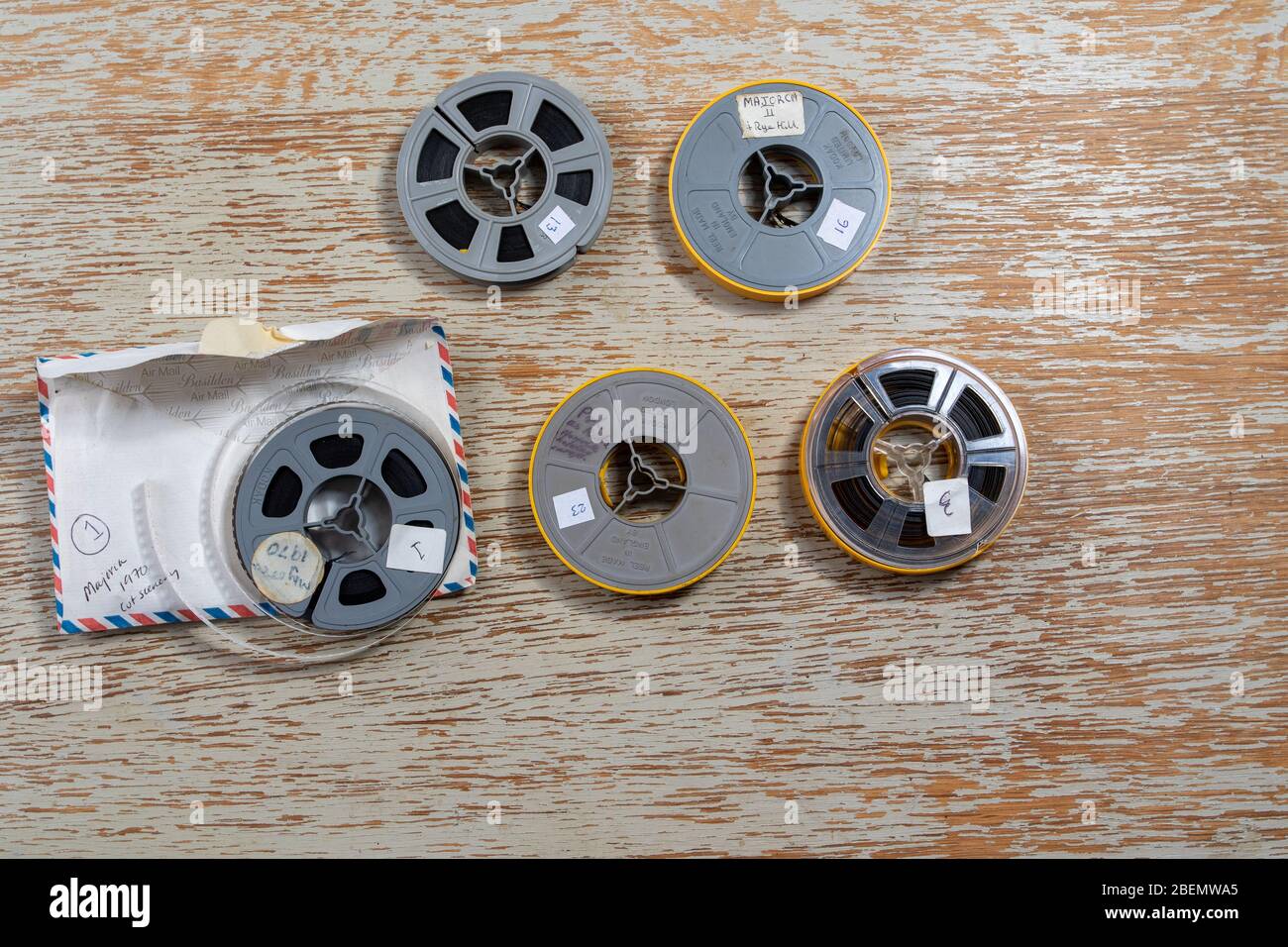 Five small plastic spools of 8mm film Stock Photo - Alamy