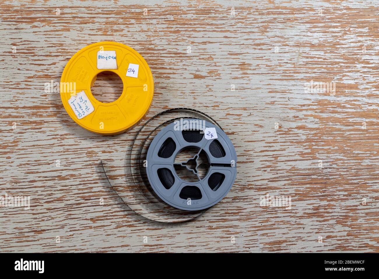 Spool of 8mm film and yellow plastic cover Stock Photo - Alamy