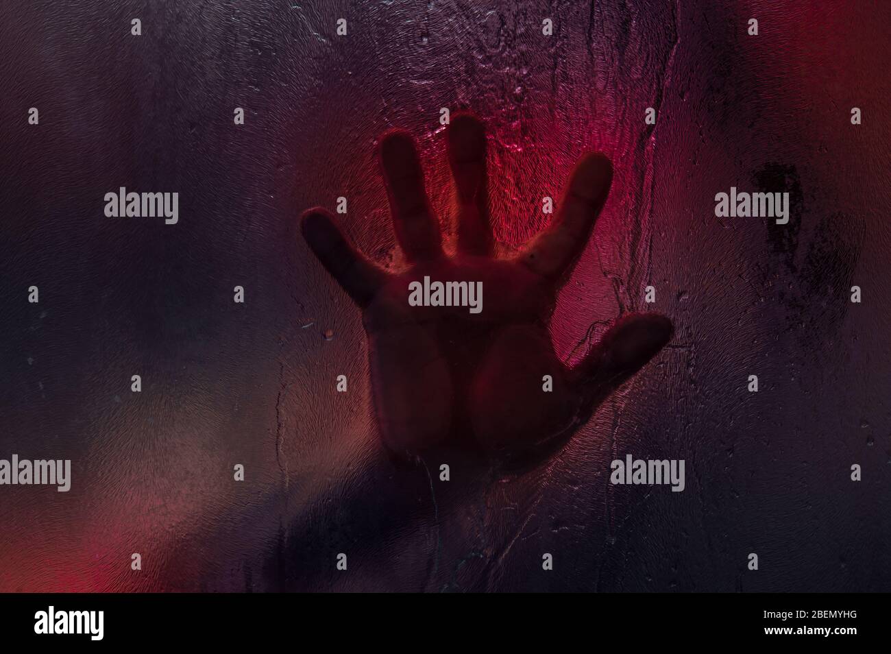 Bloody hand against wet shower glass. Horror concept. Toned image Stock ...