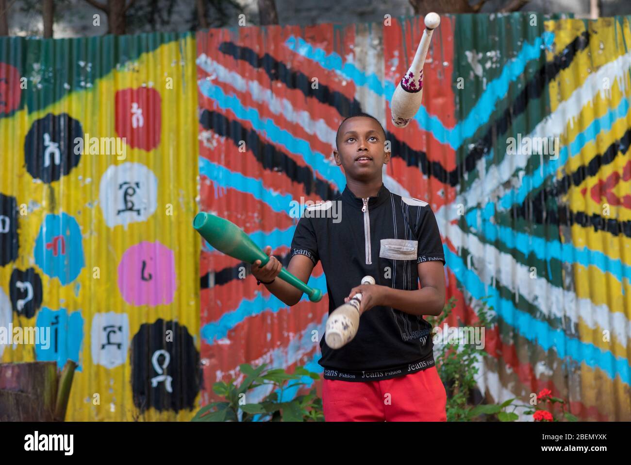 Boy practices juggling at the Fekat Circus school and community center ...