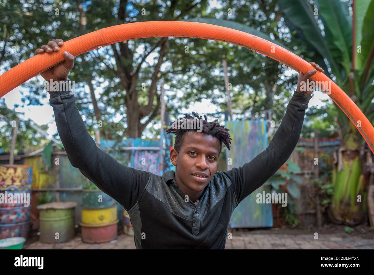 Young man practices balancing on spinning loop at the Fekat Circus ...