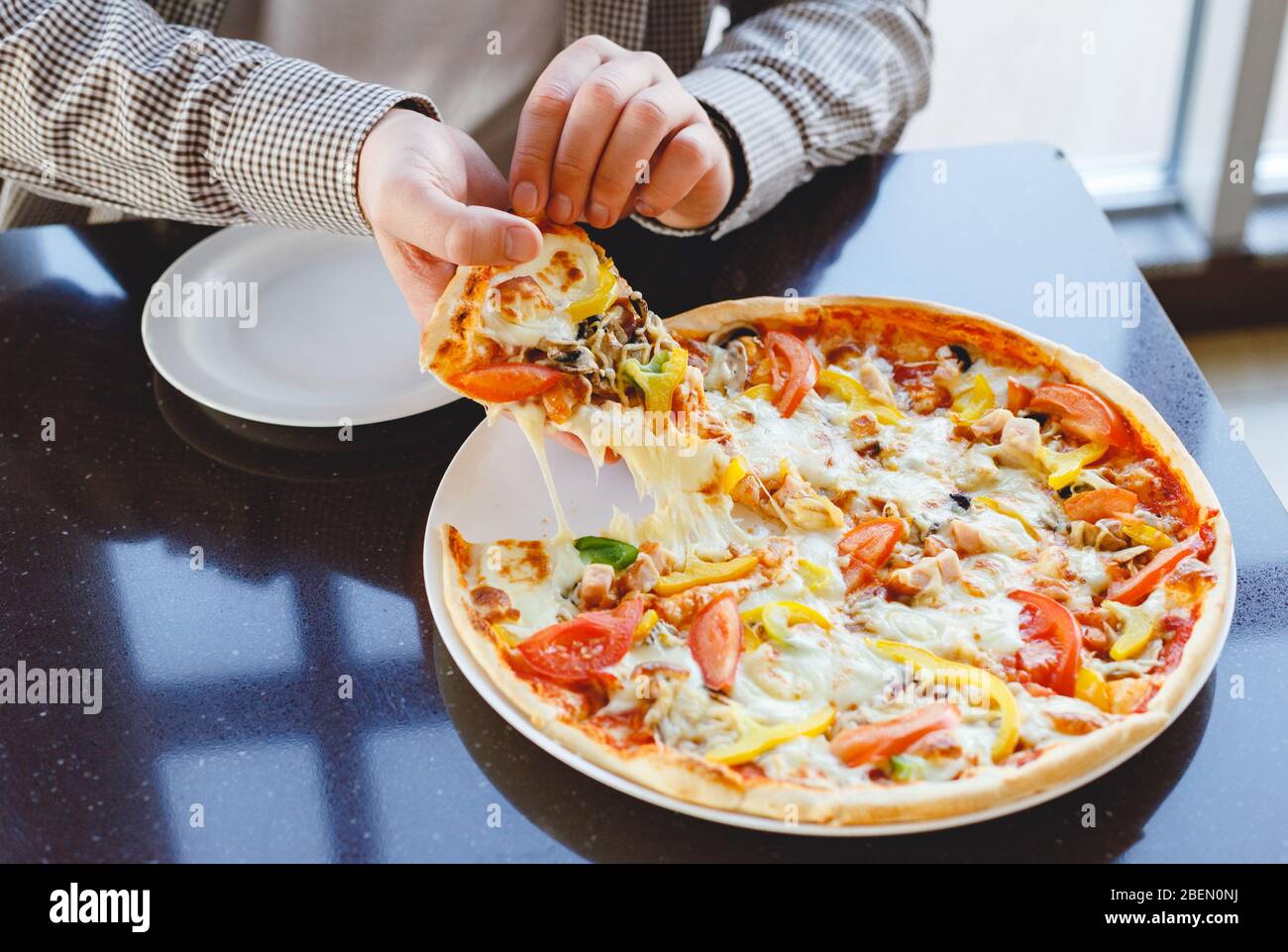 Eating pizza at home. Delicious pizza delivery. Caucasian man take ...