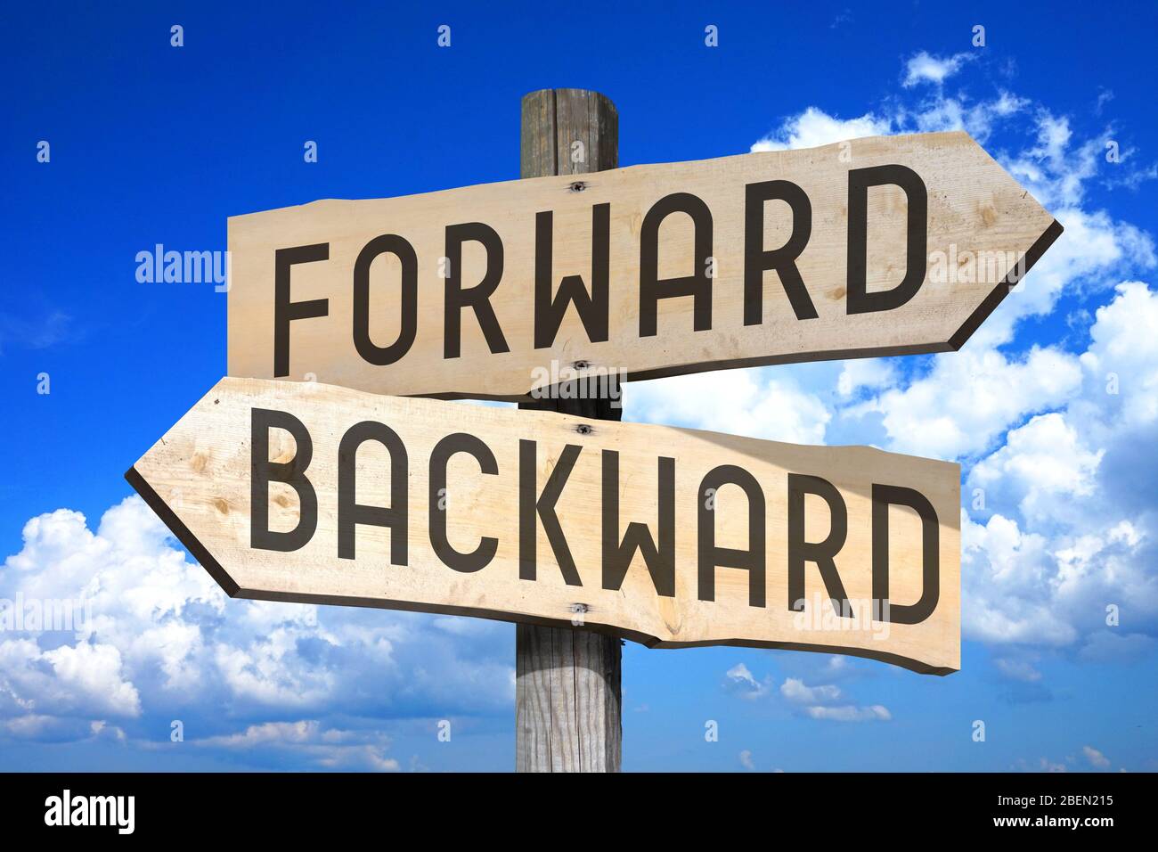 Wooden signpost with two arrows, sky Stock Photo - Alamy