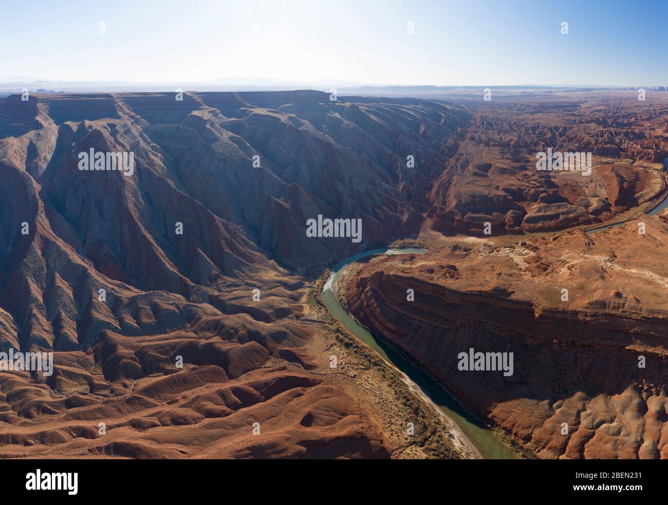 The Raplee Anticline and San Juan River in aerial over Utah desert ...