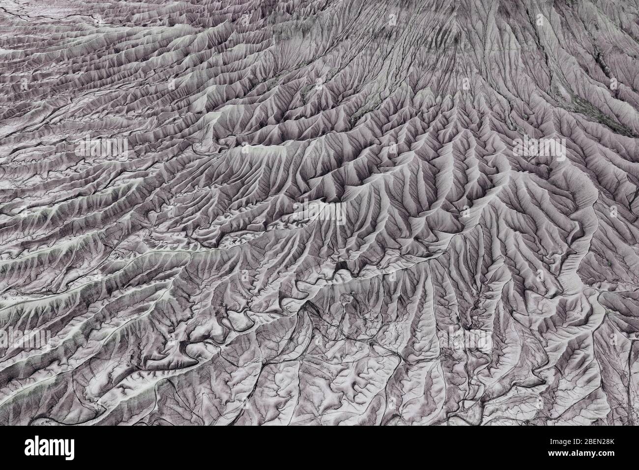 Erosion paints an abstract picture in the hills surrounding Fact Stock ...