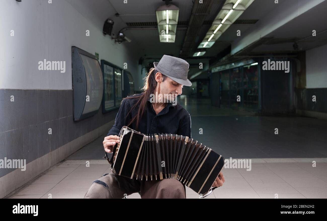 Tango performer with hat in the subway of Buenos Aires Stock Photo - Alamy