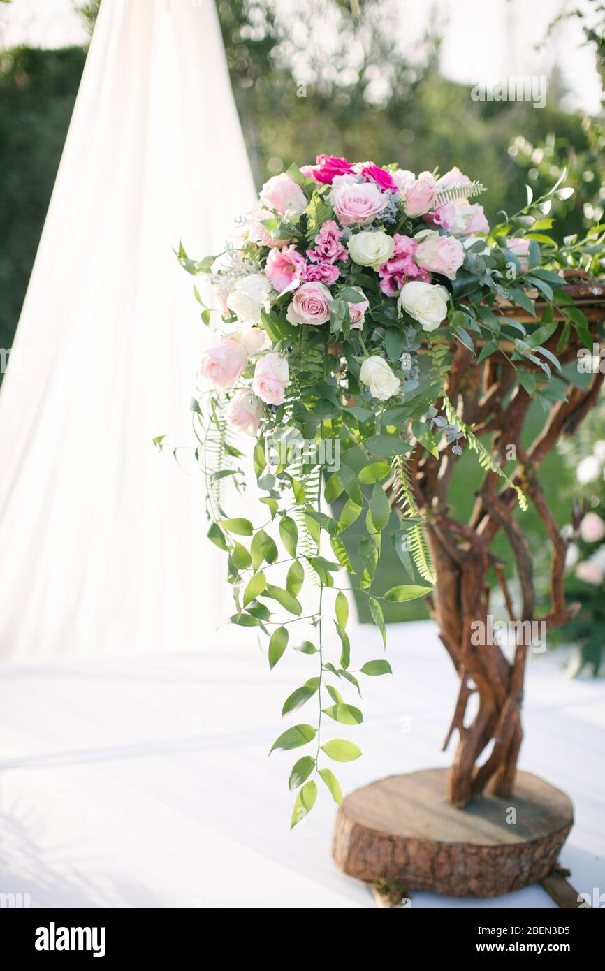 Wedding arch. Rustic wedding. Wedding area covered with flowers Stock ...