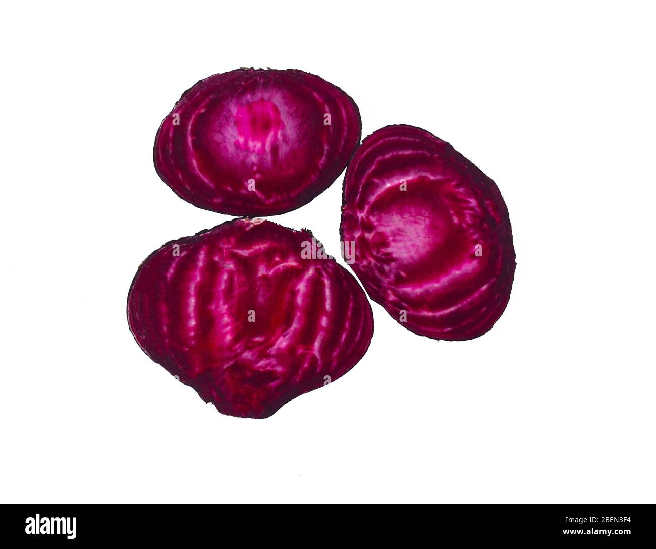 Stack of three red colored cabbage isolated on an empty white color ...