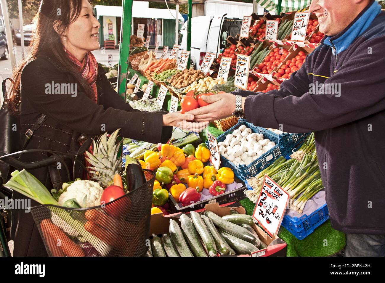 Woman and local vegetable market hi-res stock photography and images ...