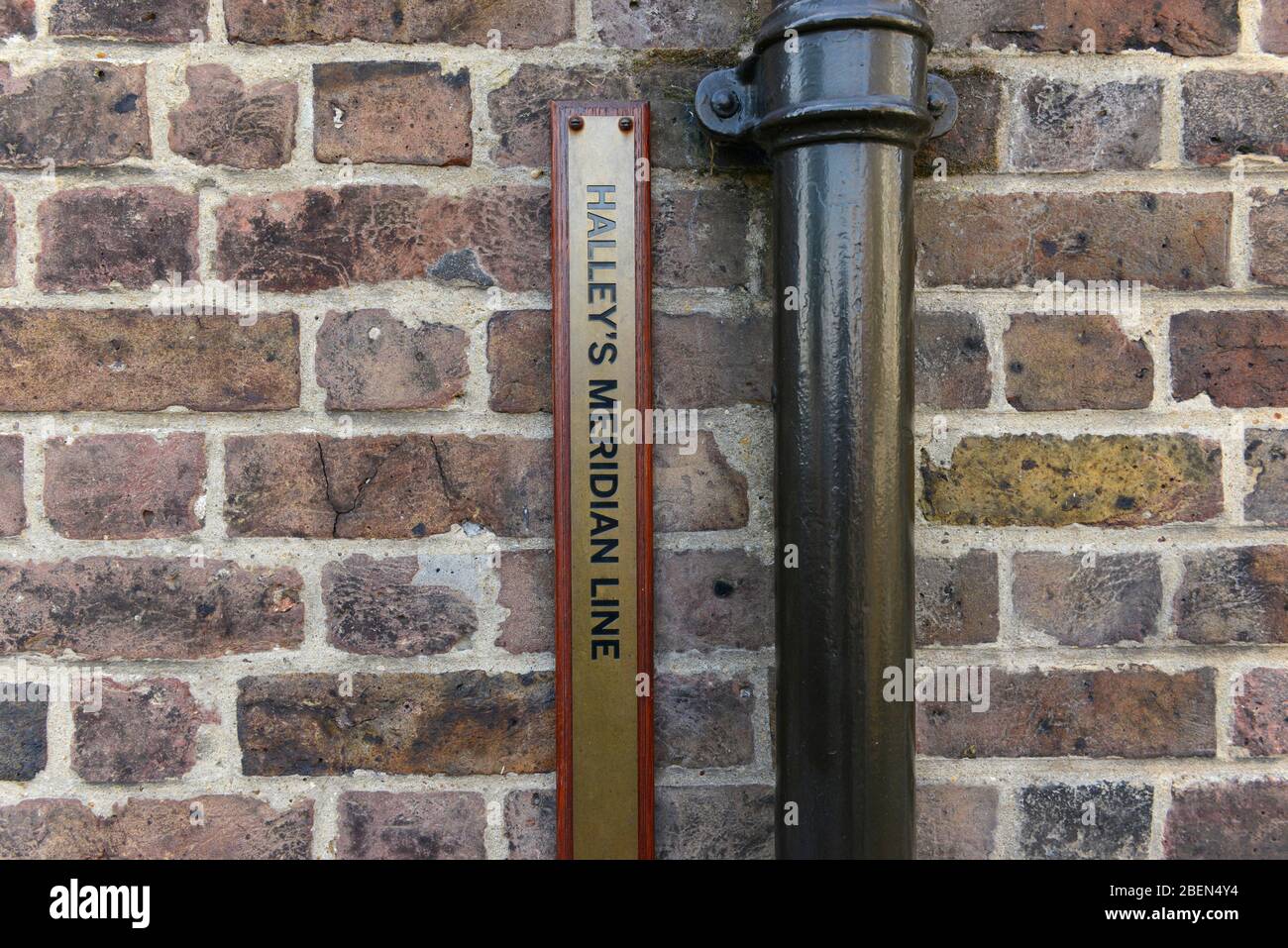 A marker noting the location of Halley's Meridian Line on a wall at the ...
