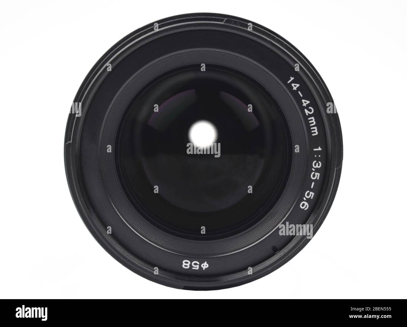 A camera lens of black color placed on an isolated empty white ...