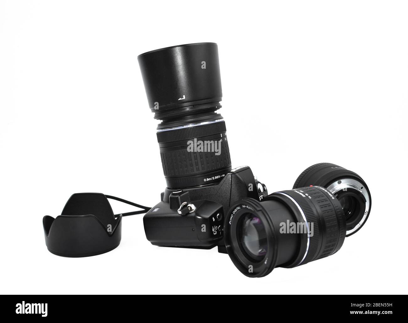 Different part of a black digital camera scattered across an isolated ...