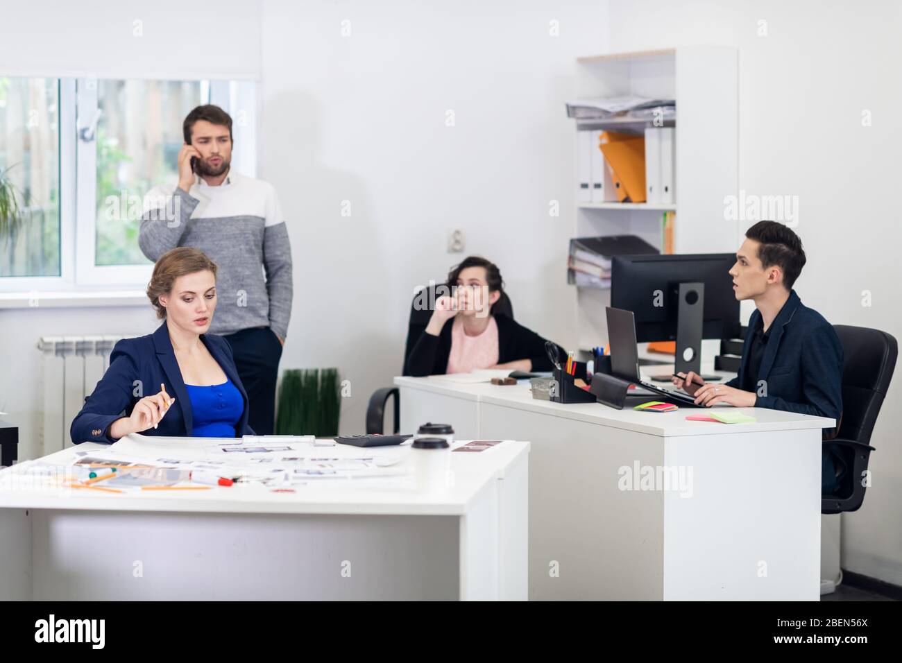 Daily work routine in a shared office Stock Photo - Alamy